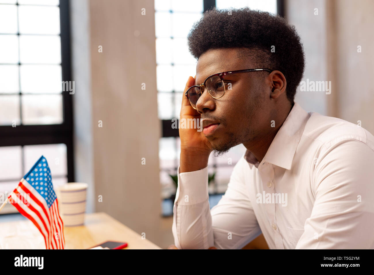 Intelligent hard working man doing his job Stock Photo - Alamy