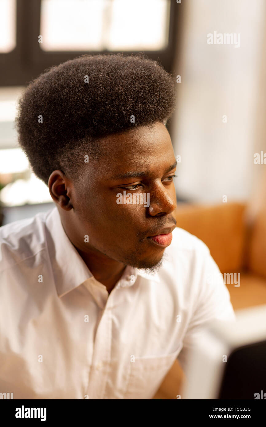 Portrait of a handsome serious young man Stock Photo - Alamy