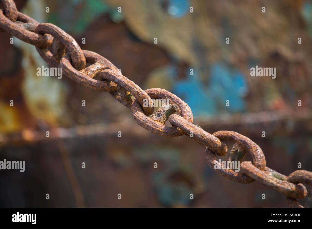 A ship wrecked fishing boat aground and abandoned rusting away on the ...