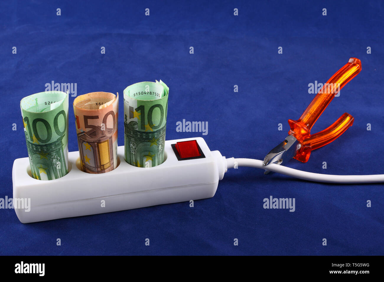 Separation of the power supply. Cutting through a power cable with the ...