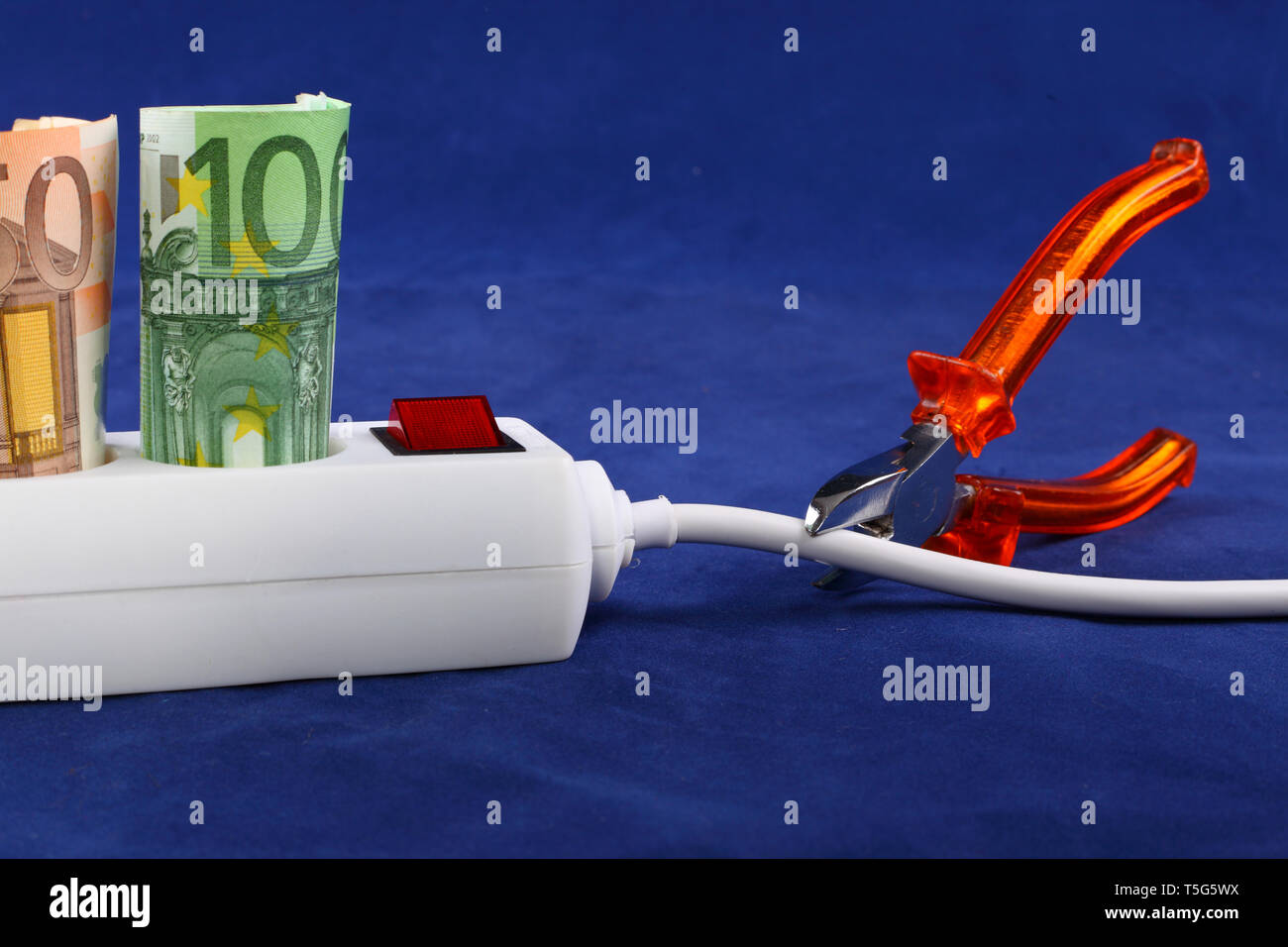 Separation of the power supply. Cutting through a power cable with the ...