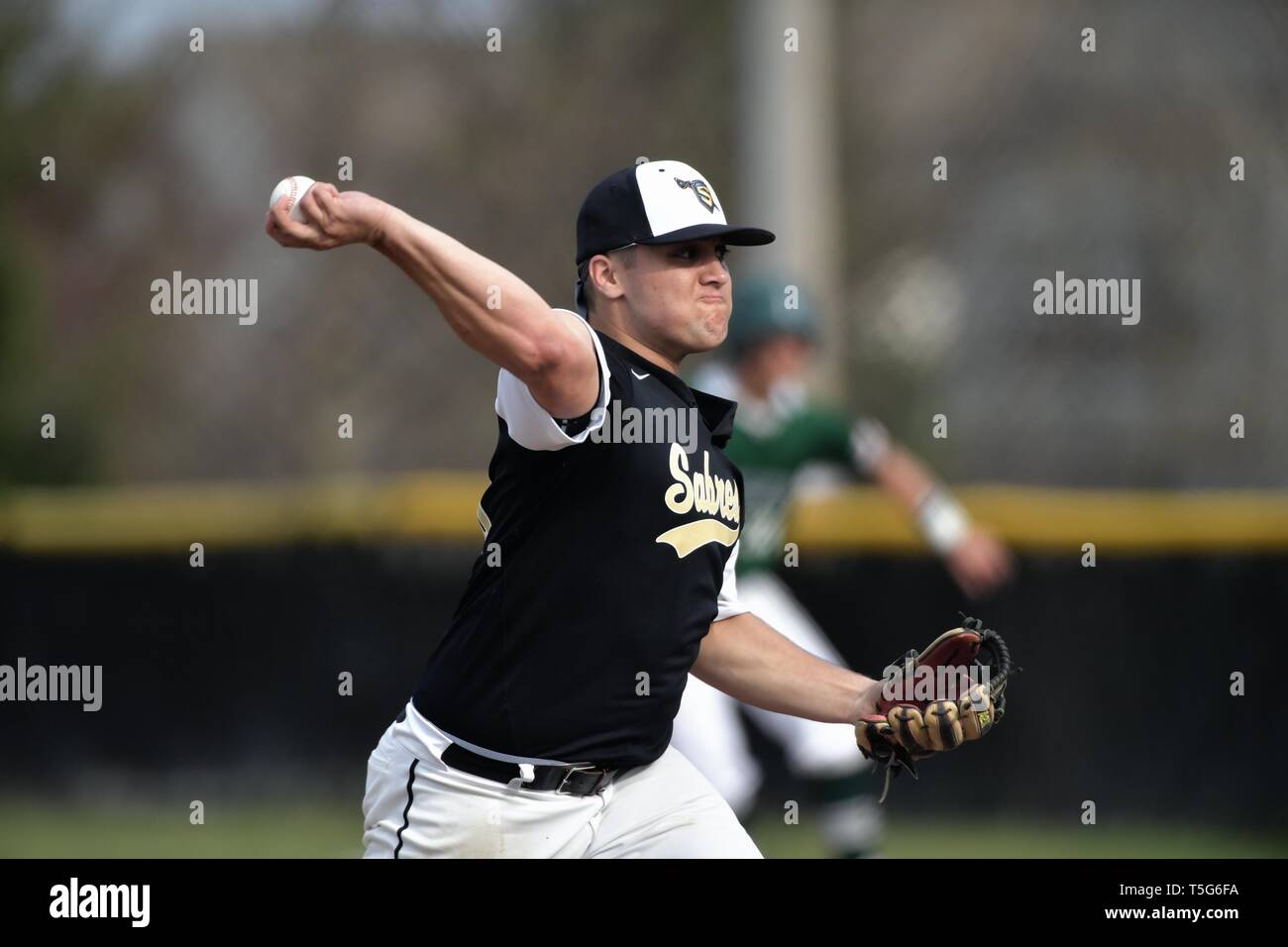 Pitcher releasing a pitch to a waiting batter. USA Stock Photo - Alamy