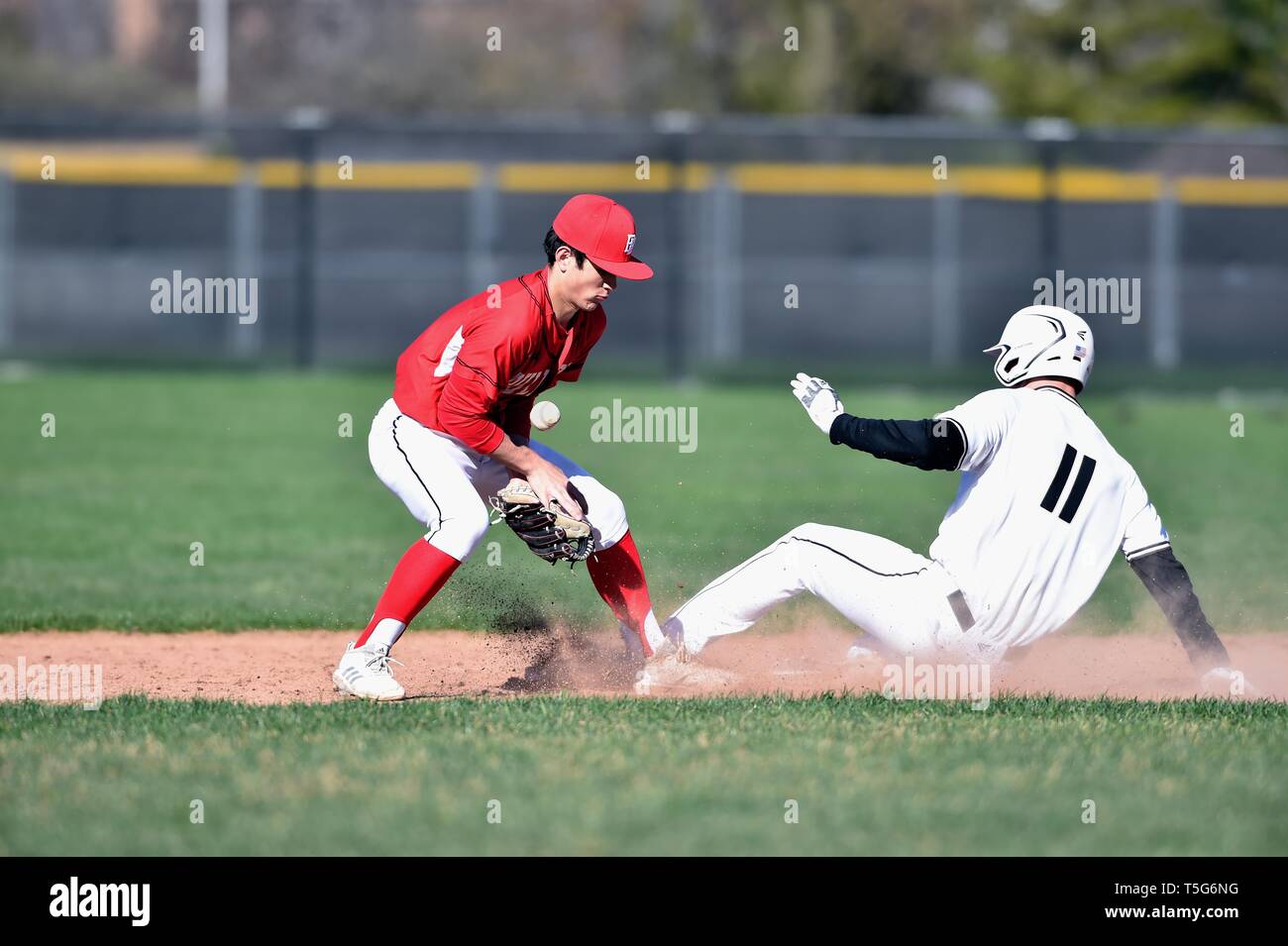 Slide fielding hi-res stock photography and images - Alamy