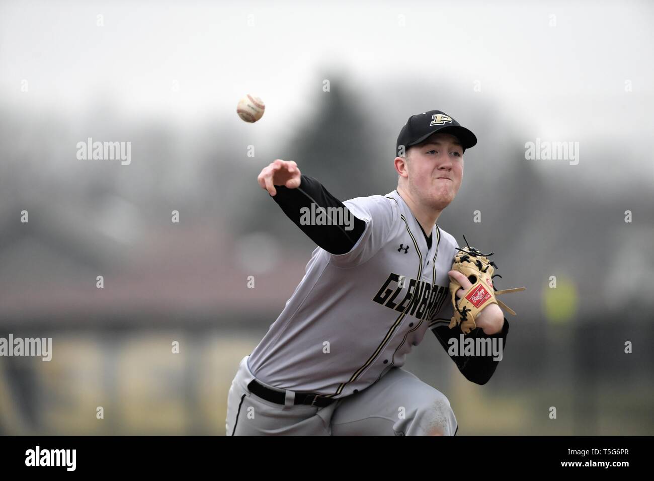 Pitcher releasing a pitch to a waiting batter. USA Stock Photo - Alamy