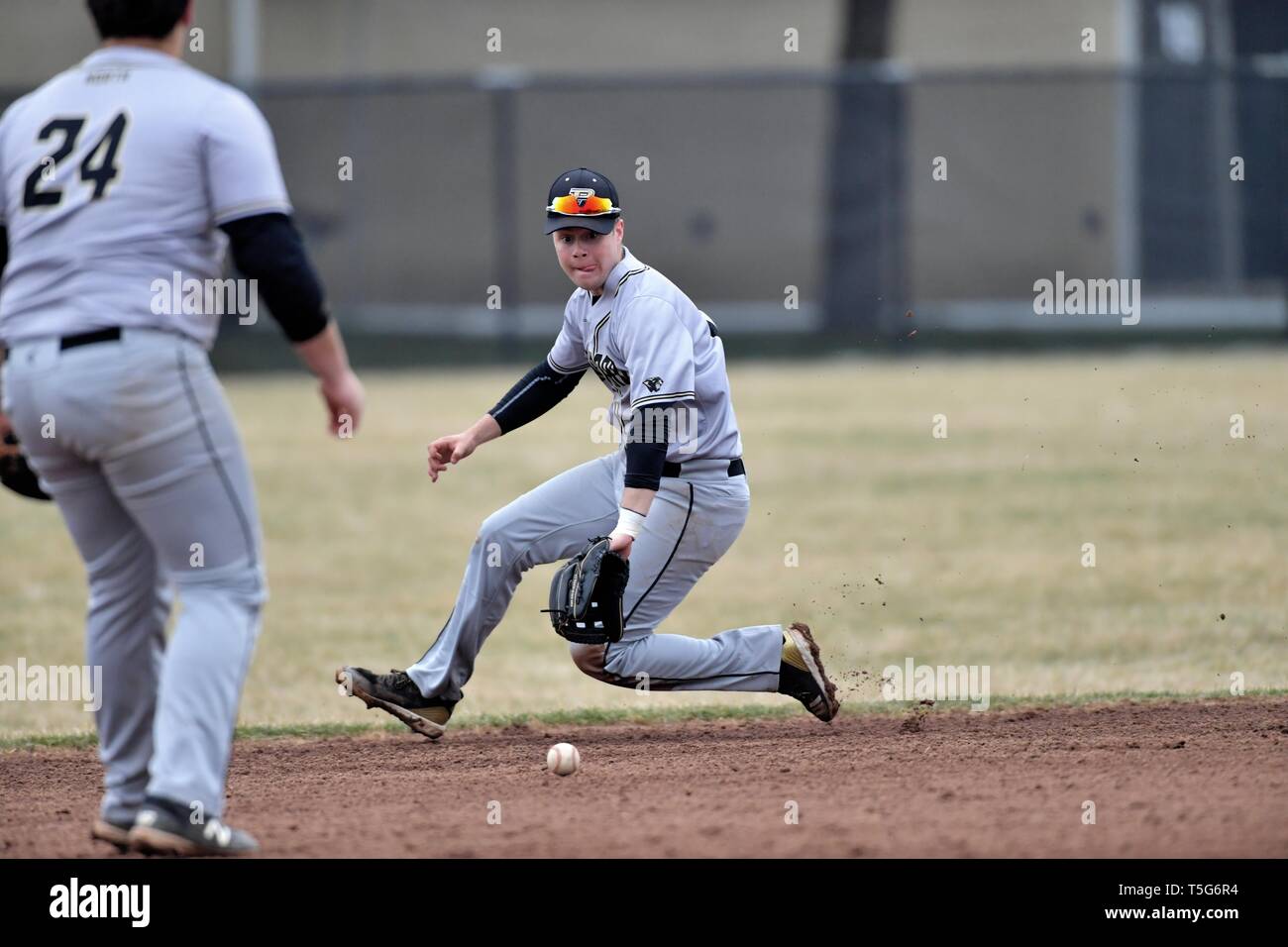 Throw ball ground hi-res stock photography and images - Alamy