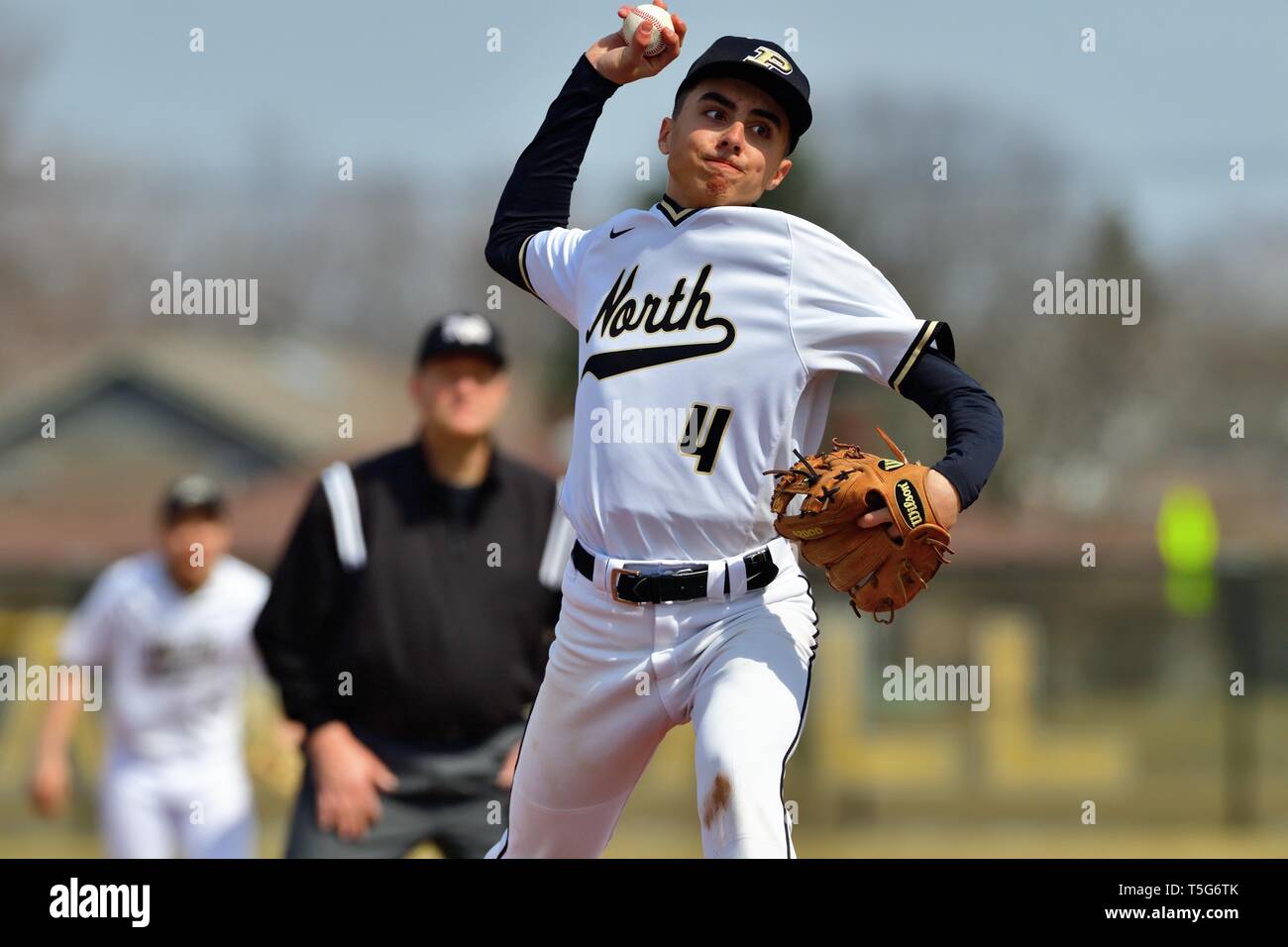 Pitcher releasing a first-inng pitch to a waiting opposing batter. USA ...