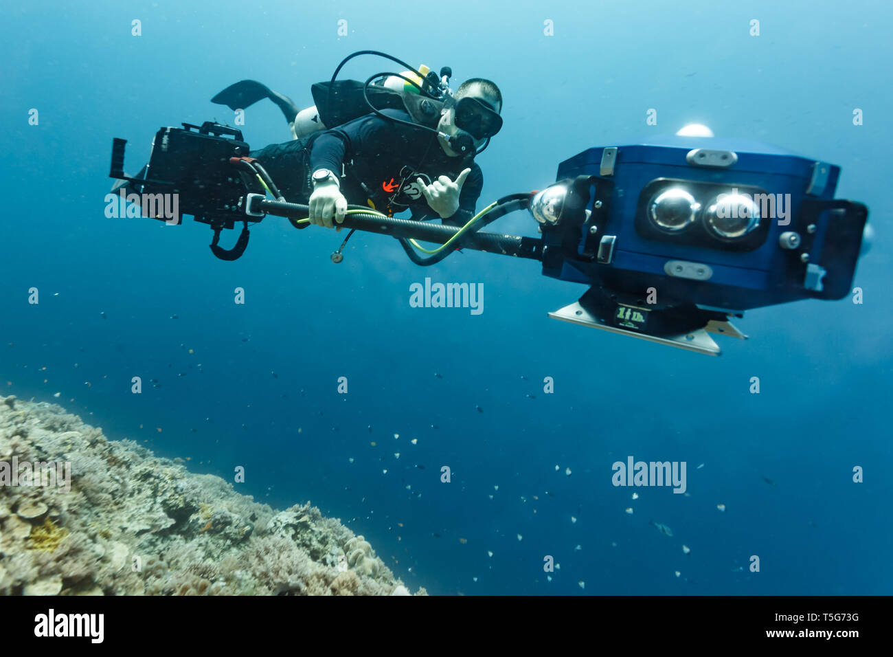 closeup of diver operating long underwater virtual reality camera Stock ...