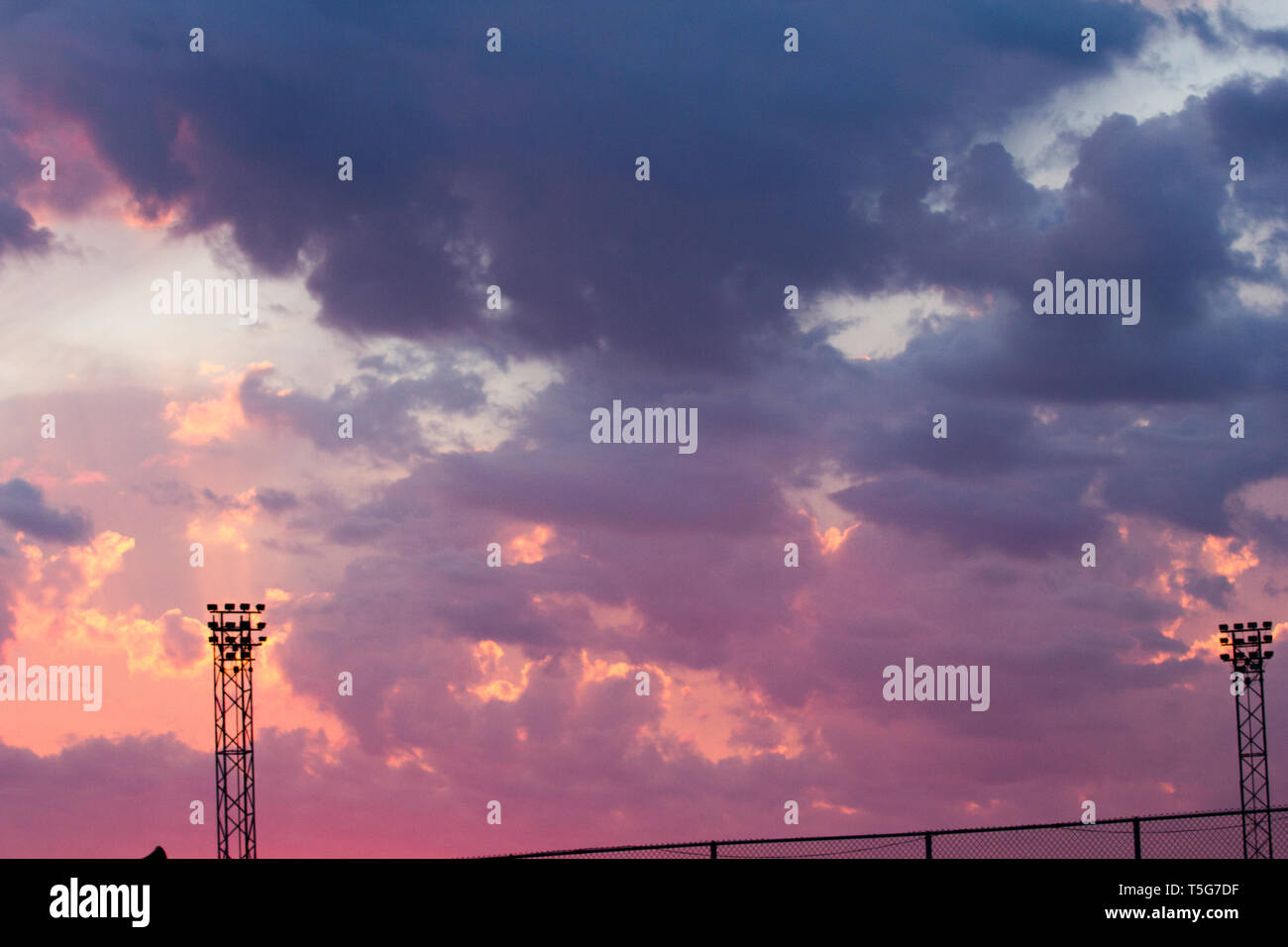 Stadium Lights Sunset Stock Photo - Alamy