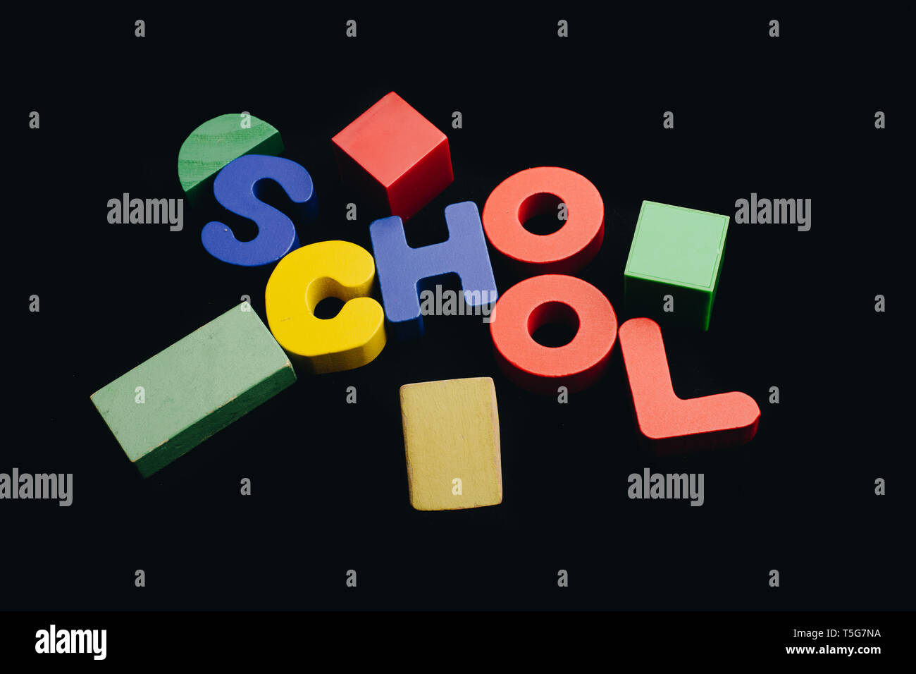 Education concept by School lettering with colorful wooden letters ...
