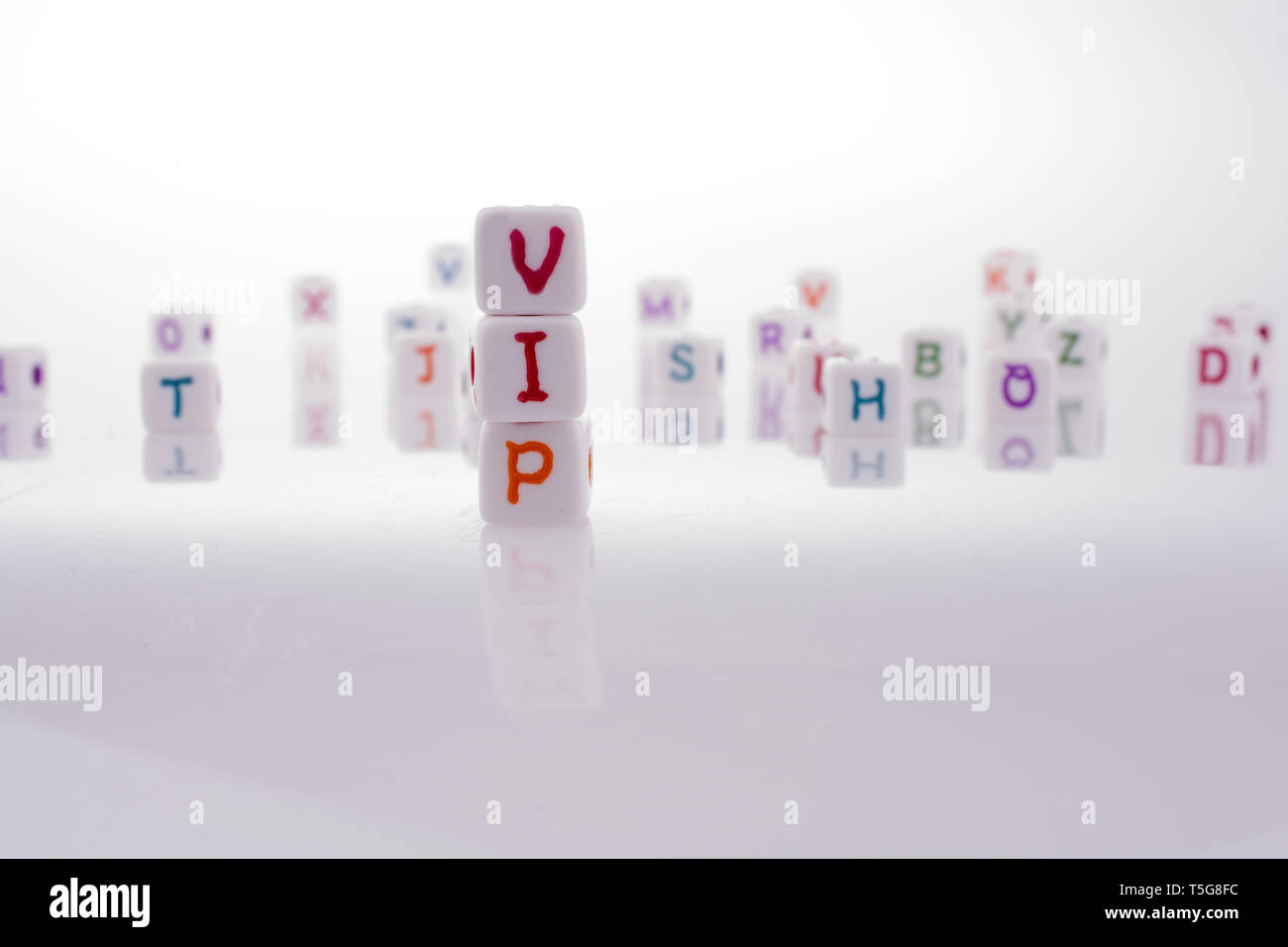 alphabet blocks and the word VIP on a white background Stock Photo - Alamy