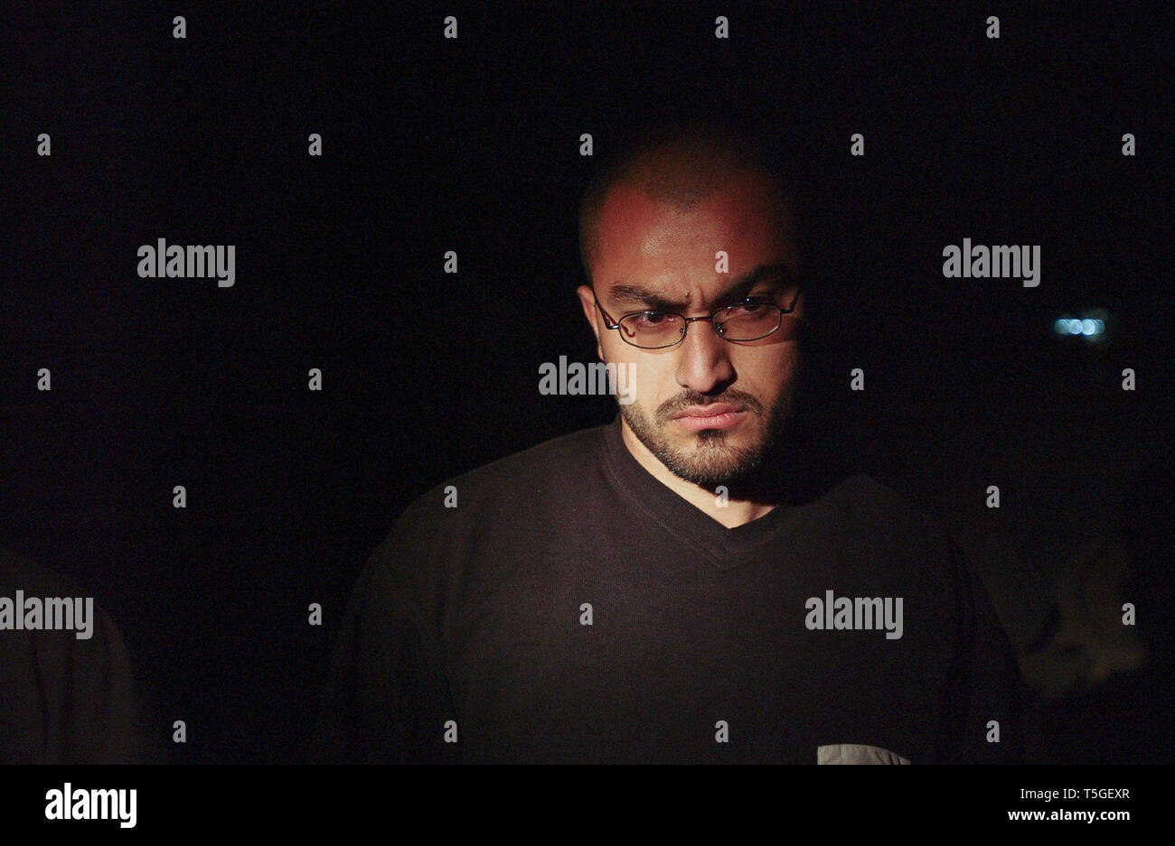 Baghdad, Baghdad, Iraq. 6th Apr, 2004. An Iraqi man is questioned by ...