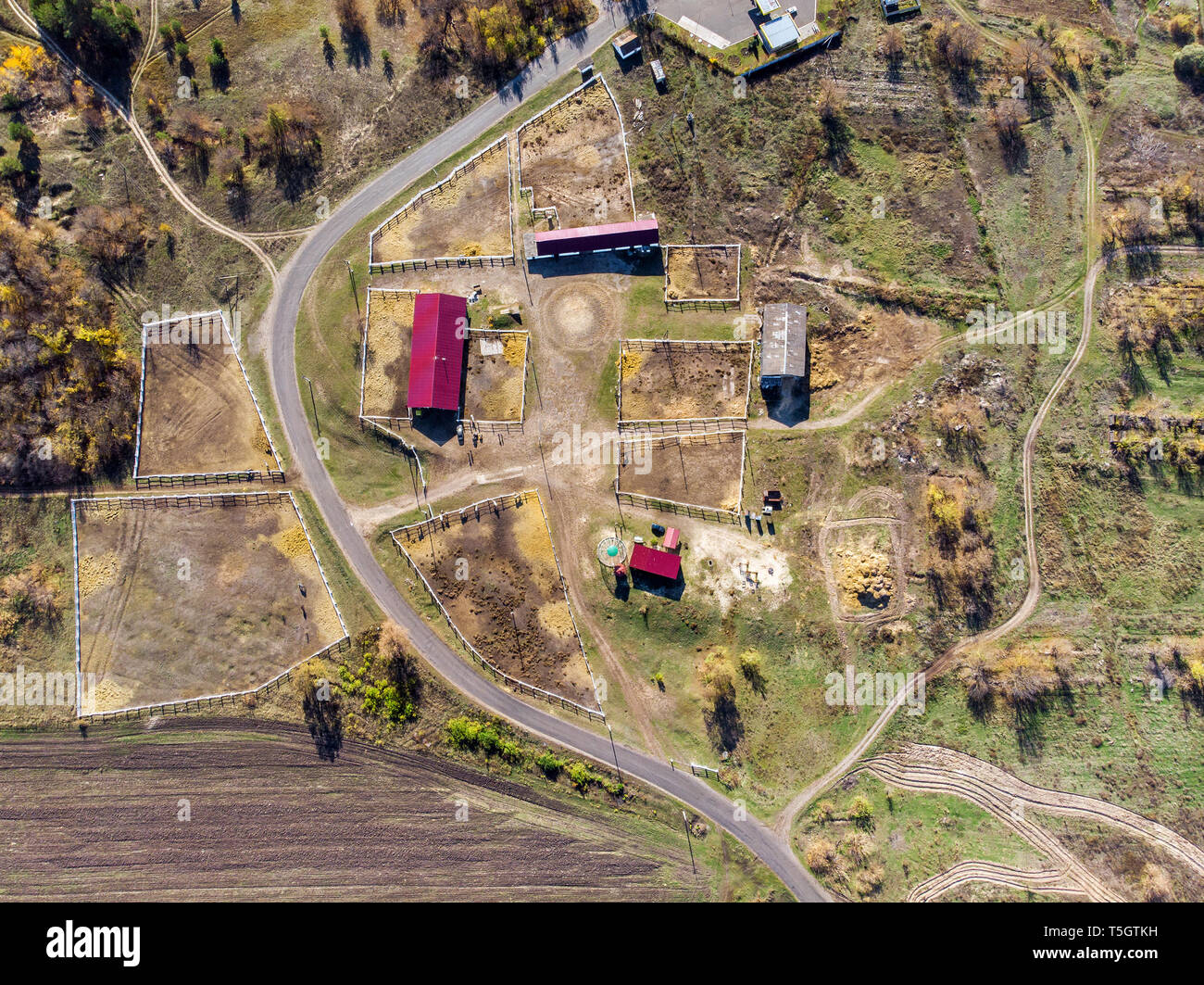 Aerial drone view of rural horse farm or ranch. Village or countryside ...