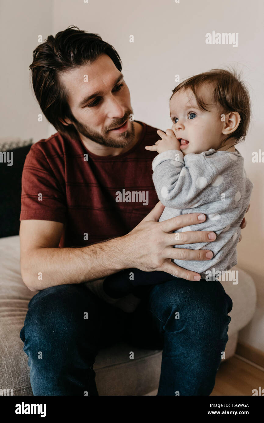 Father holding his girl hi-res stock photography and images - Alamy