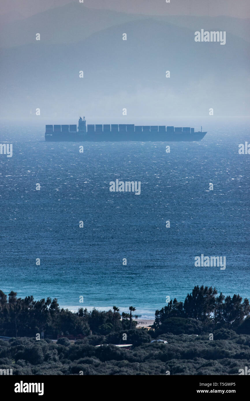 Spain, Andalusia, Tarifa, Strait of Gibraltar, container ship and fog ...