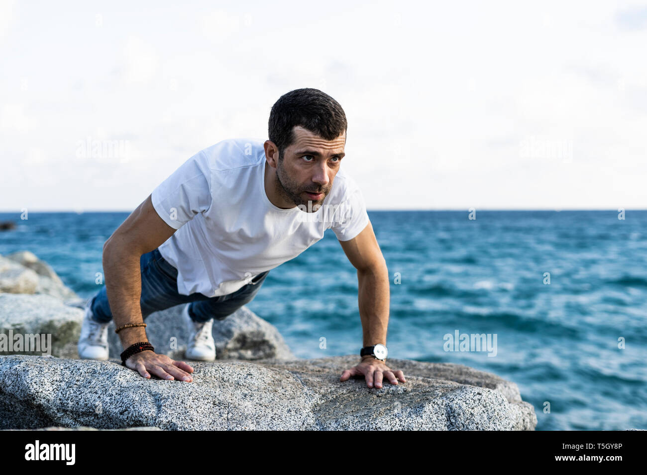 Rock sea man hi-res stock photography and images - Alamy
