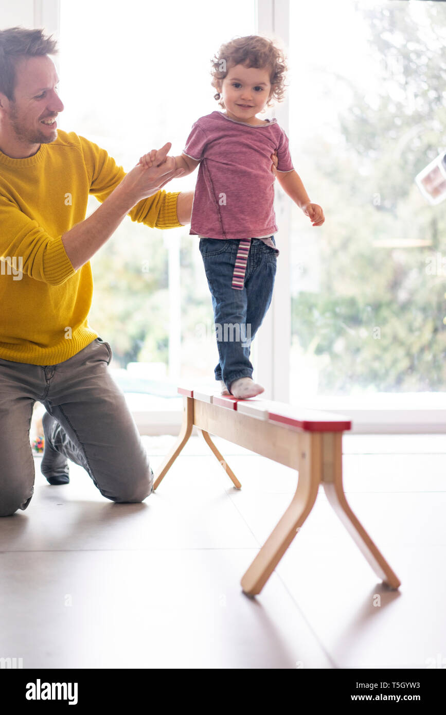 Daughter helping father hi-res stock photography and images - Alamy