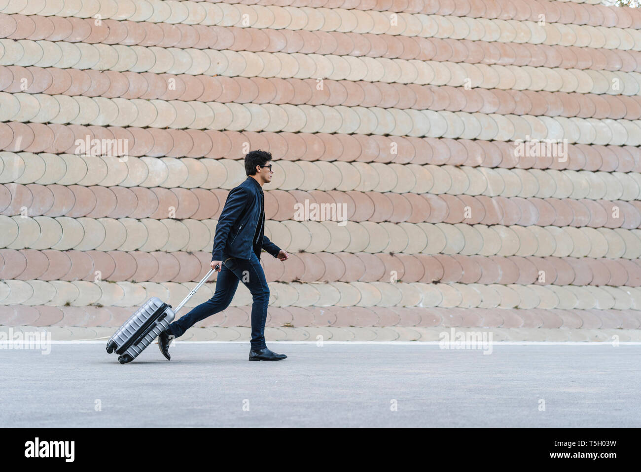 Businessman running with suitcase hi-res stock photography and images ...