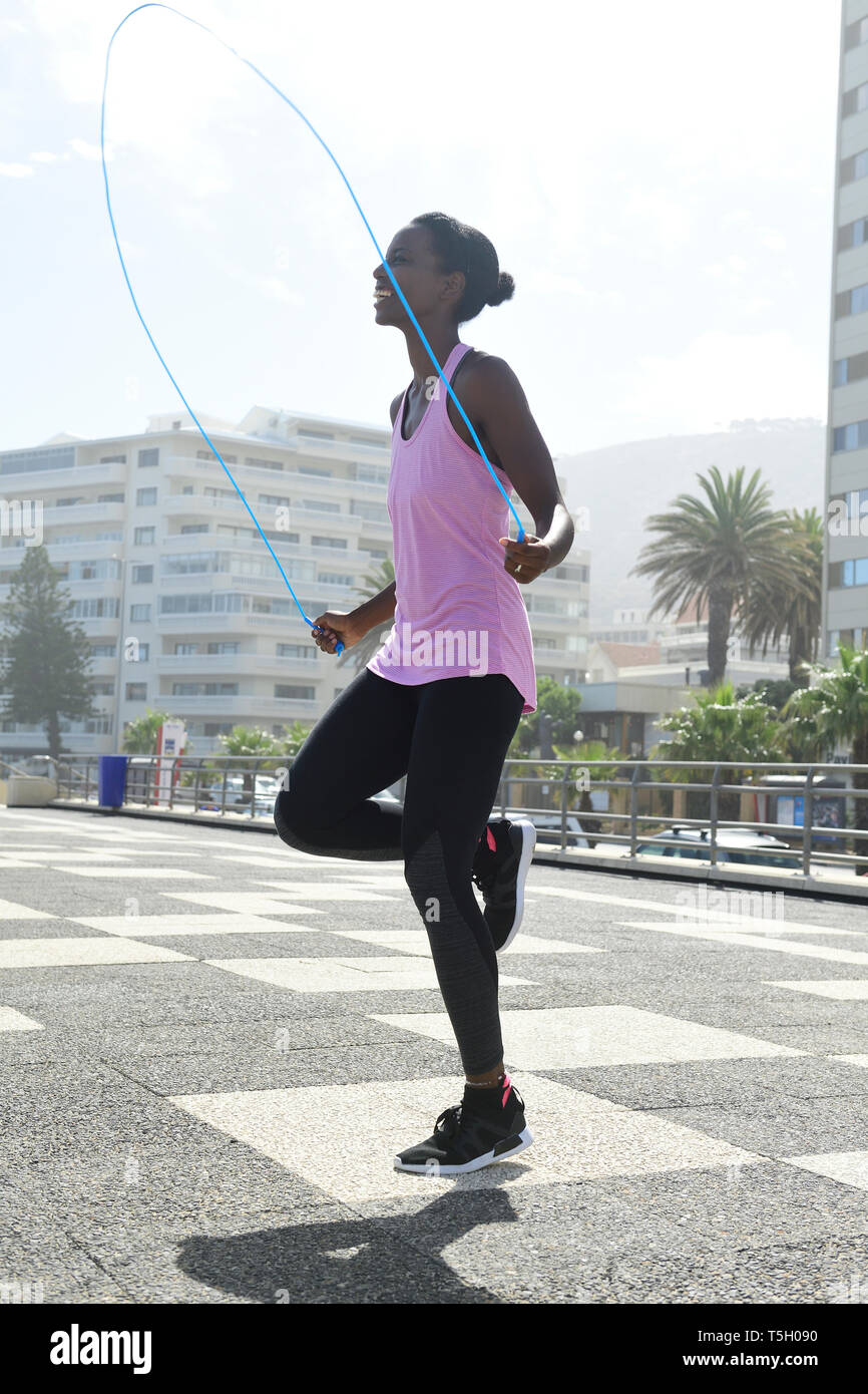 Woman skipping rope hi-res stock photography and images - Alamy