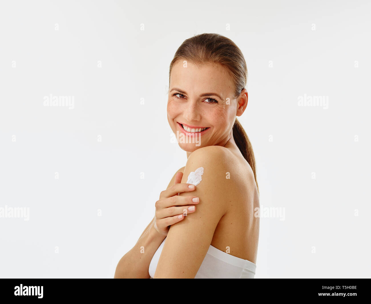 Woman creme shoulder hi-res stock photography and images - Alamy