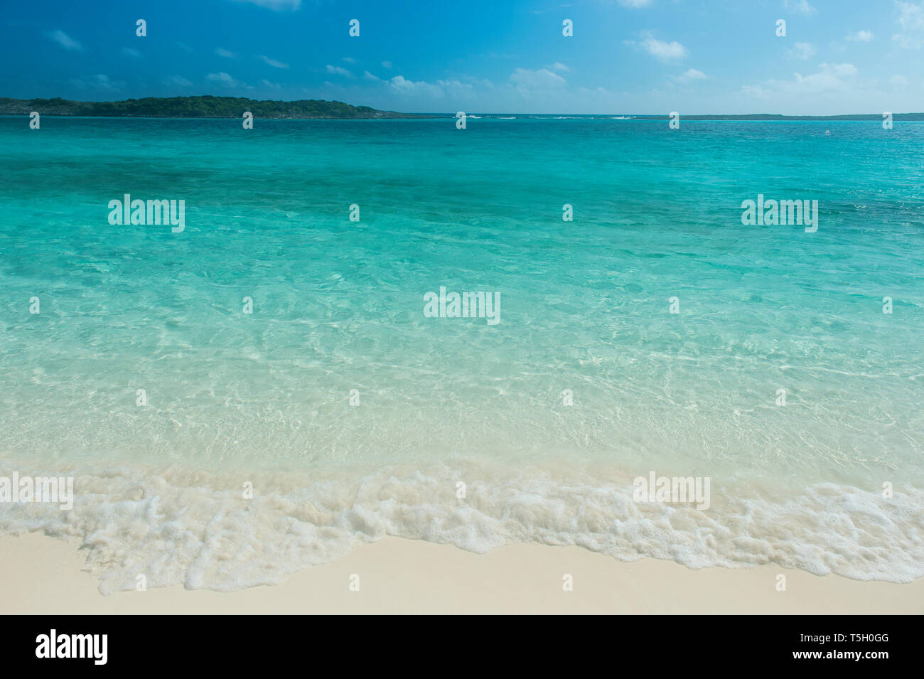Caribbean, Bahamas, Exuma, turquoise waters and a white sand beach ...