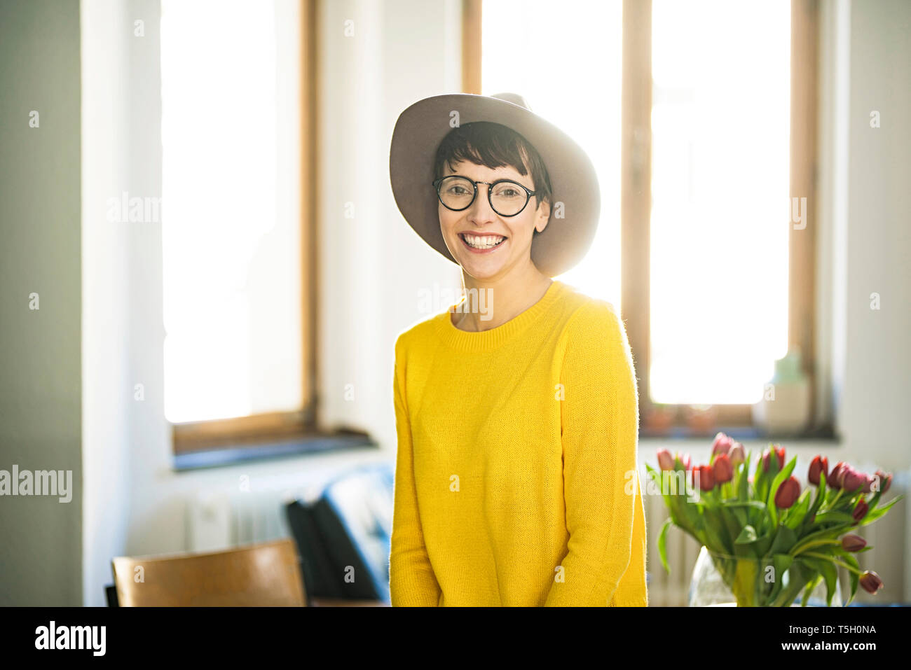 Happy stylish woman hi-res stock photography and images - Alamy