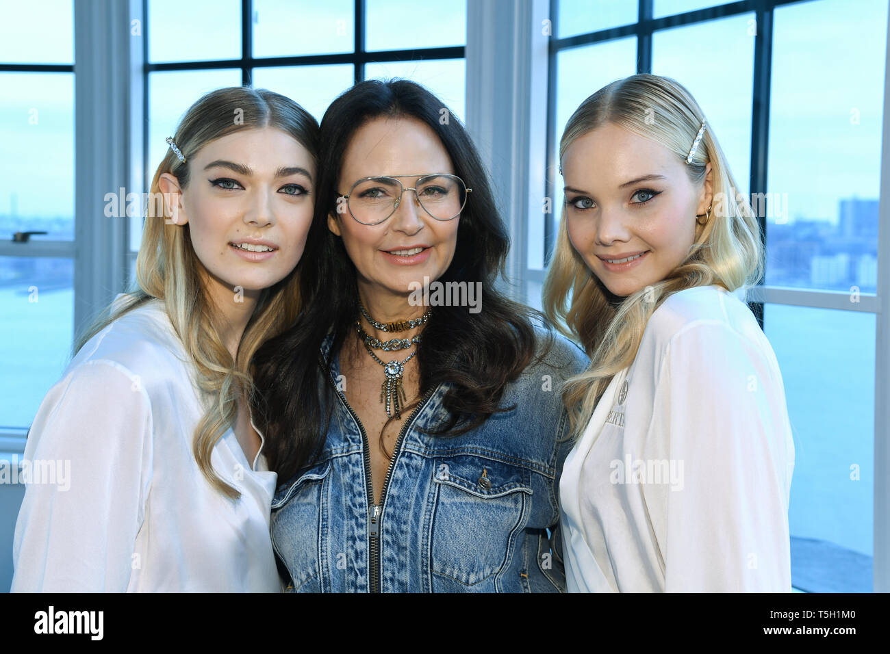 NEW YORK, NY - APRIL 12: Designer Berta Balilti and models posing ...