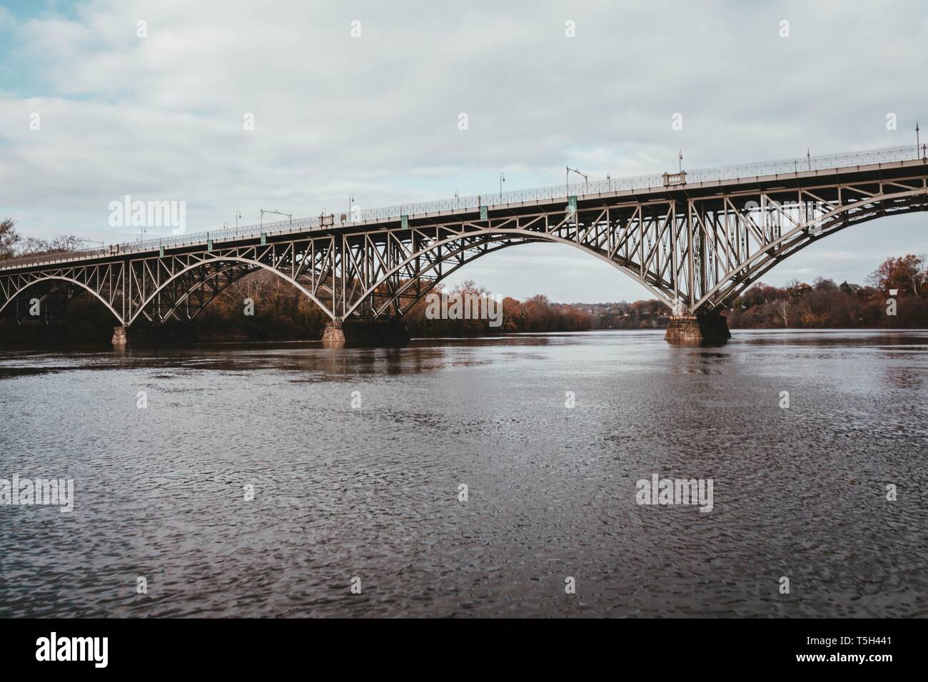 A steel bridge over a river Stock Photo - Alamy