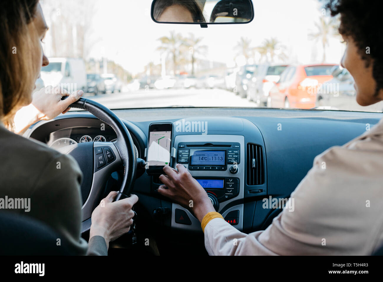 Car driving through city hi-res stock photography and images - Alamy