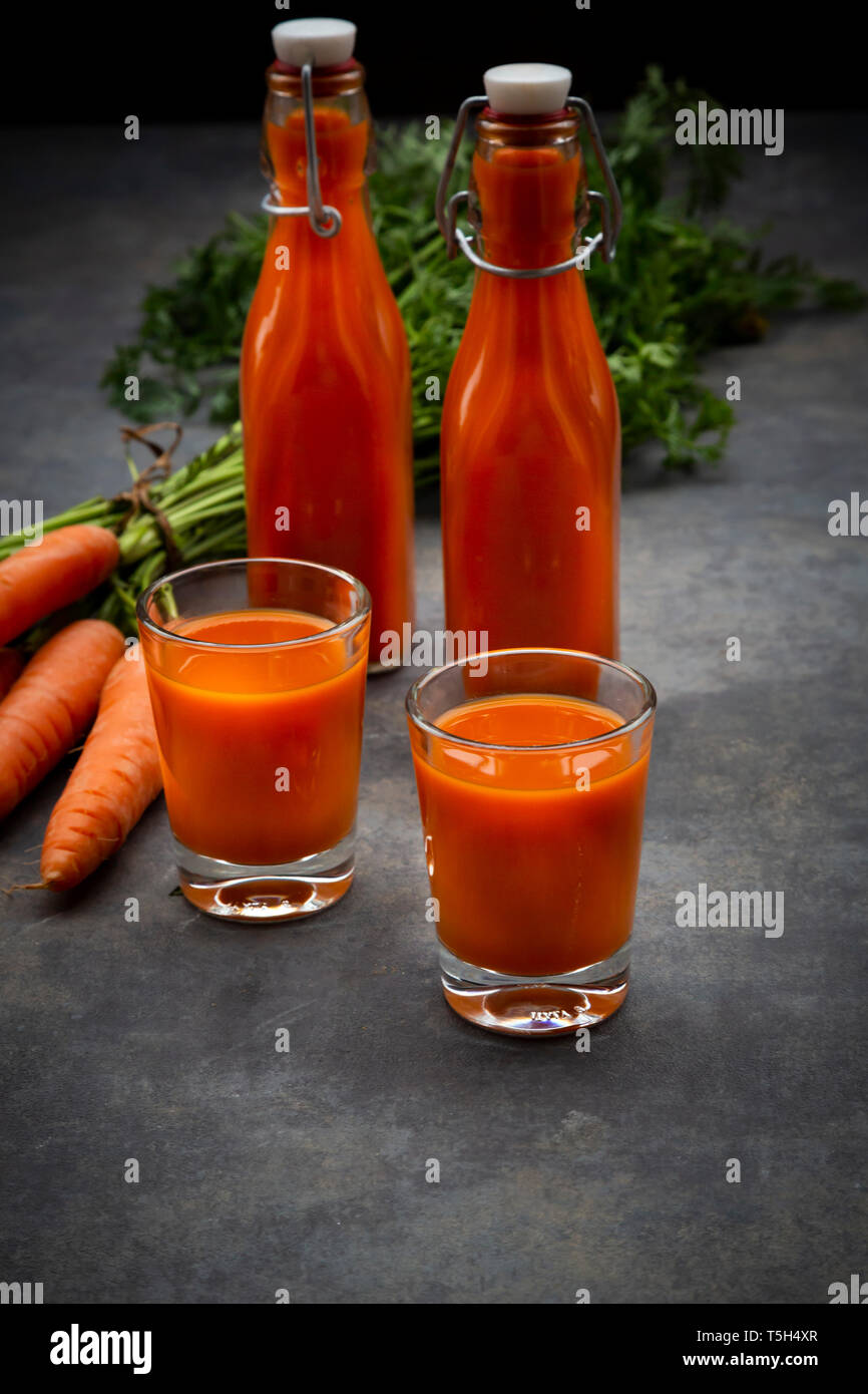 Carrot juice bottles glasses hi-res stock photography and images - Alamy