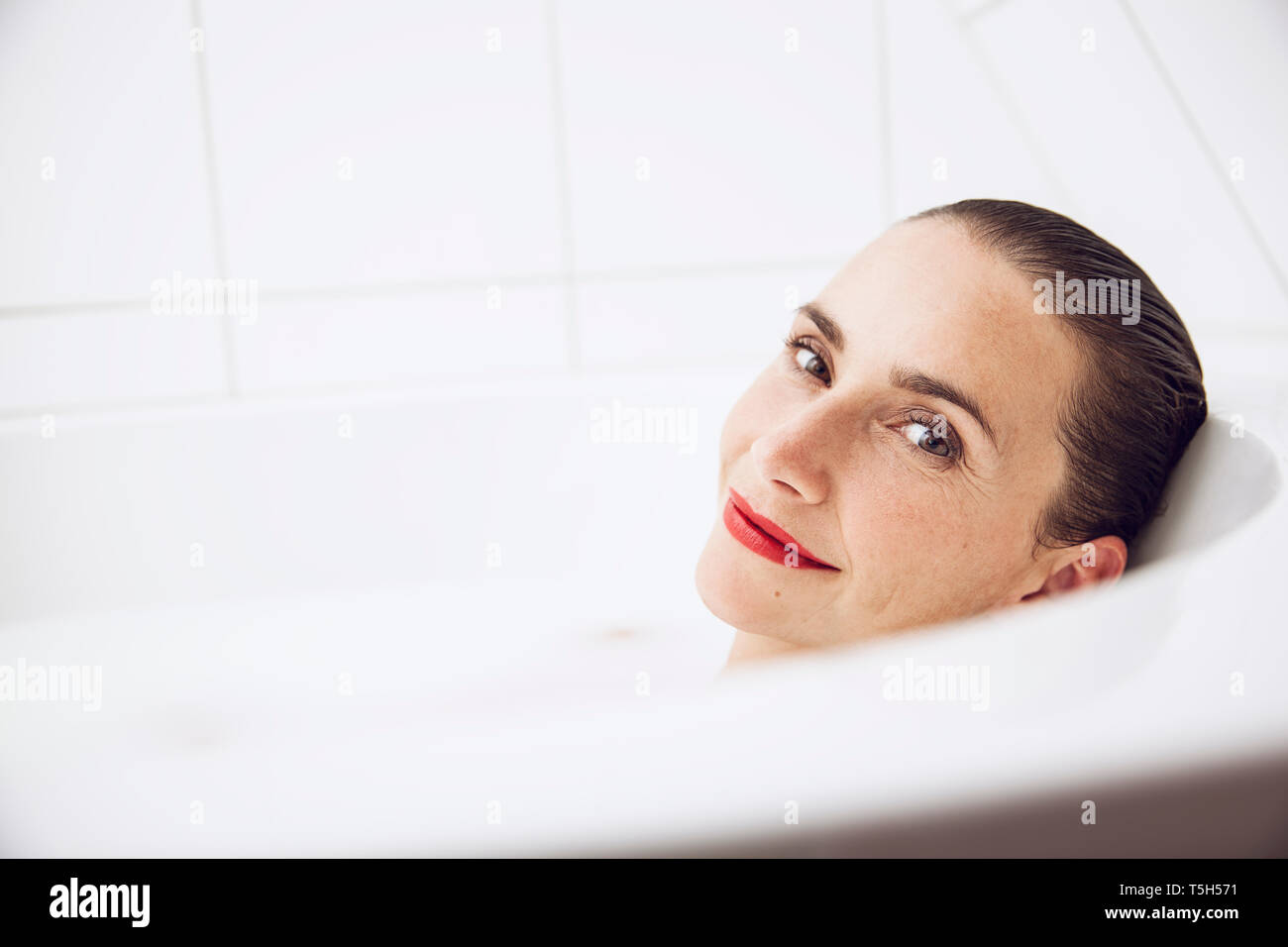 Woman in milk bath hi-res stock photography and images - Alamy