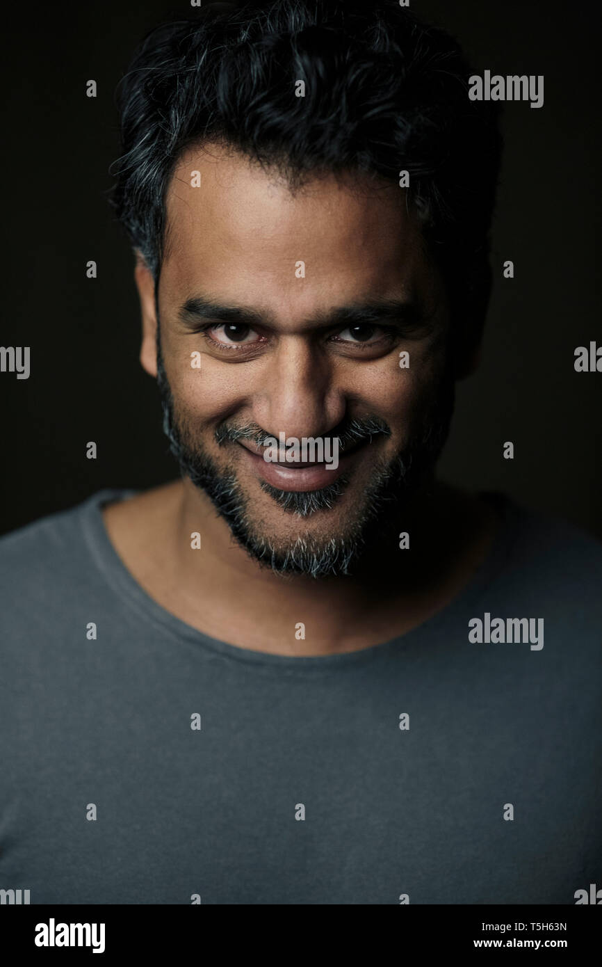 Indian man smiling hi-res stock photography and images - Alamy