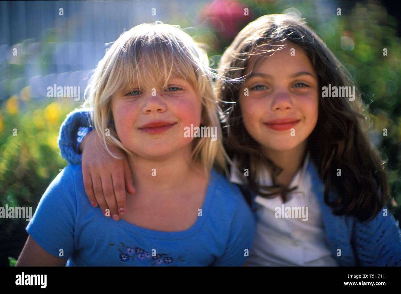 Front view of two chubby young girls Stock Photo - Alamy