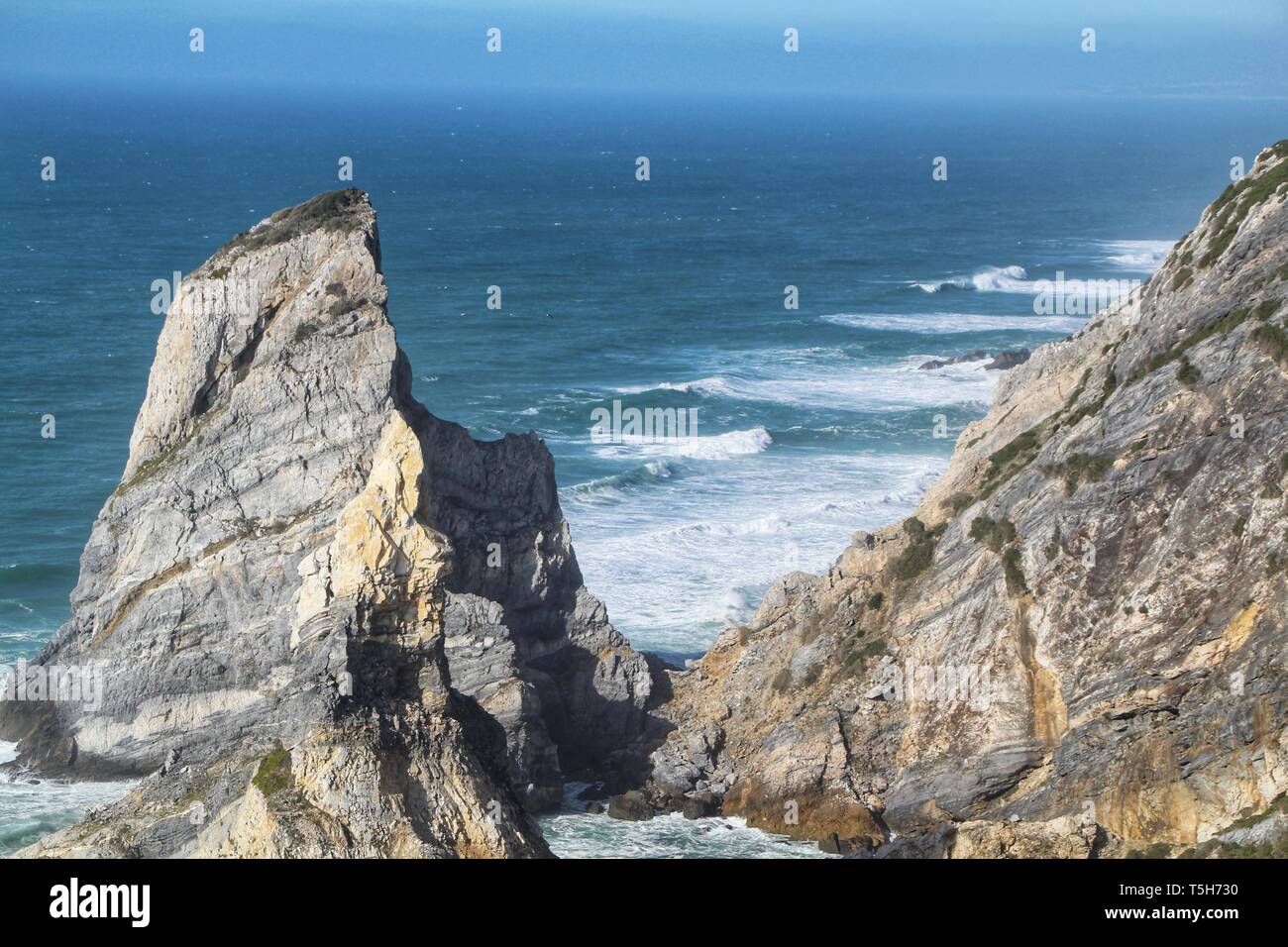 Beautiful Ursa beach with its colossal rock formations and the blue ...