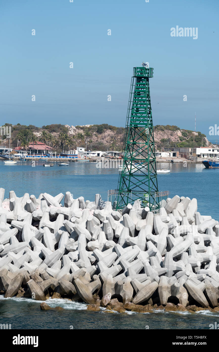 Light tower on concrete form breakwater, Mazatlan harbor, Mexico Stock ...