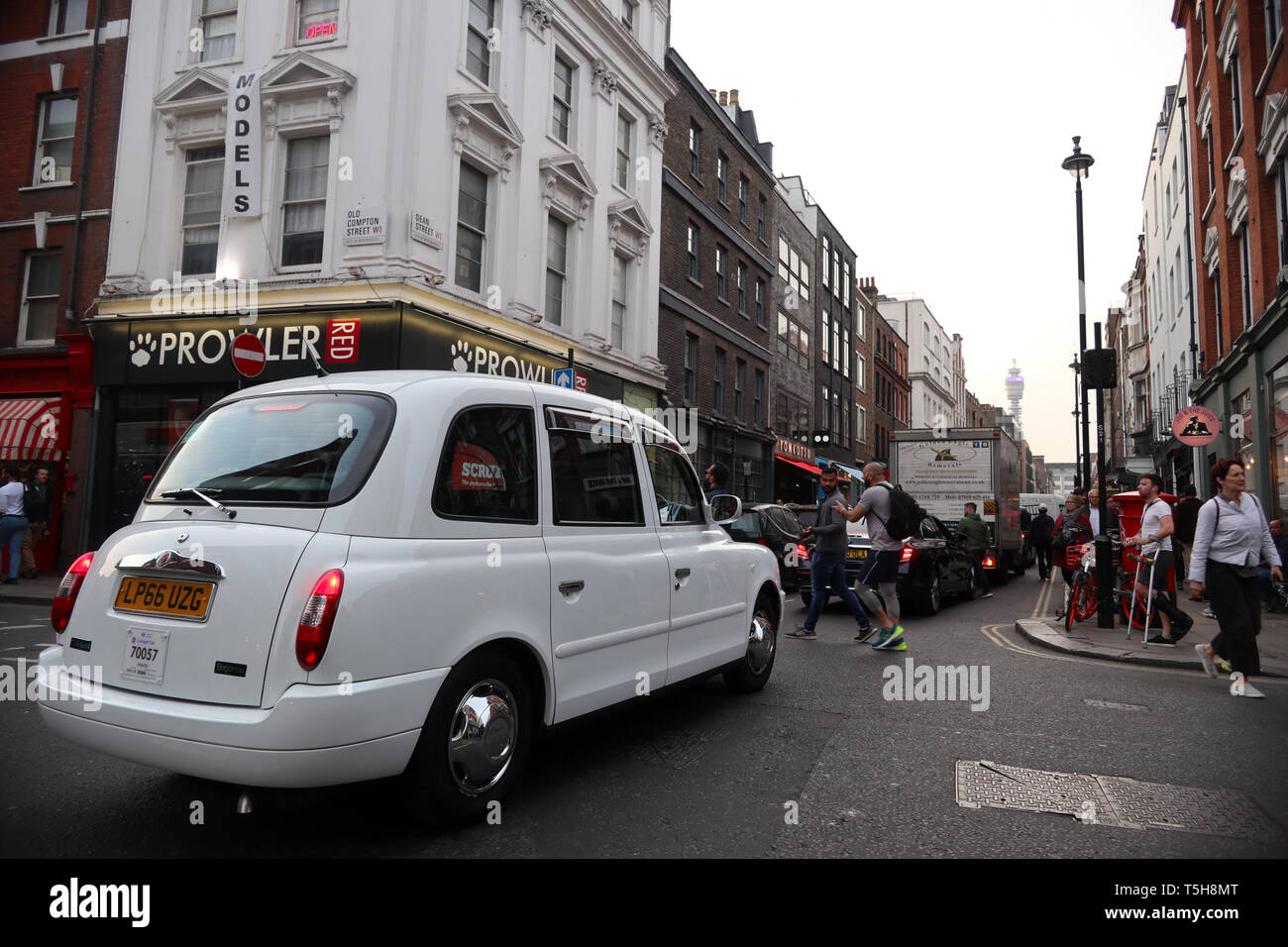 White Taxi in Little Italy, Soho, London, England, UK Stock Photo - Alamy