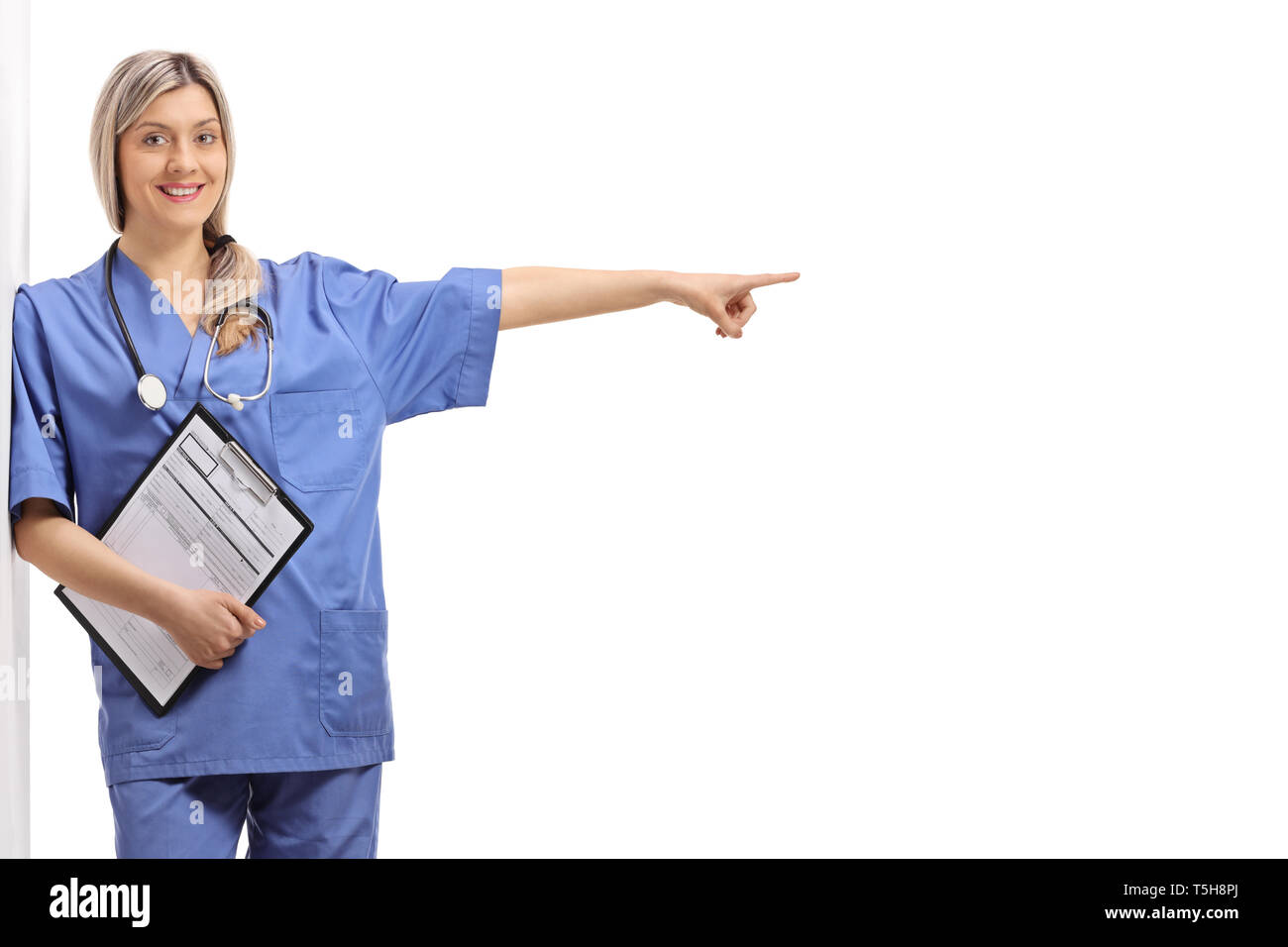 Blond female nurse leaning against hi-res stock photography and images ...