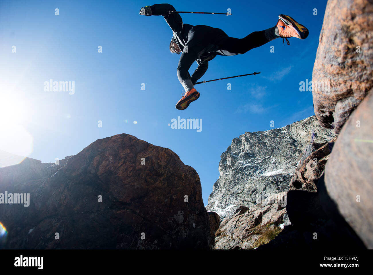 Running jumping athlete hi-res stock photography and images - Alamy