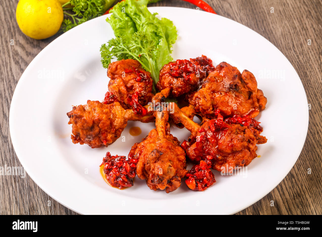 Indian traditional cuisine - Chicken lollipops with spices Stock Photo ...