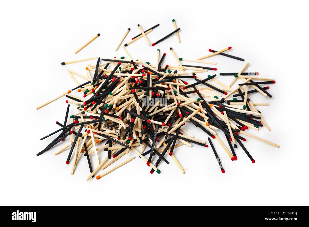 A lot of matches are mixed, of different color, isolated on white ...
