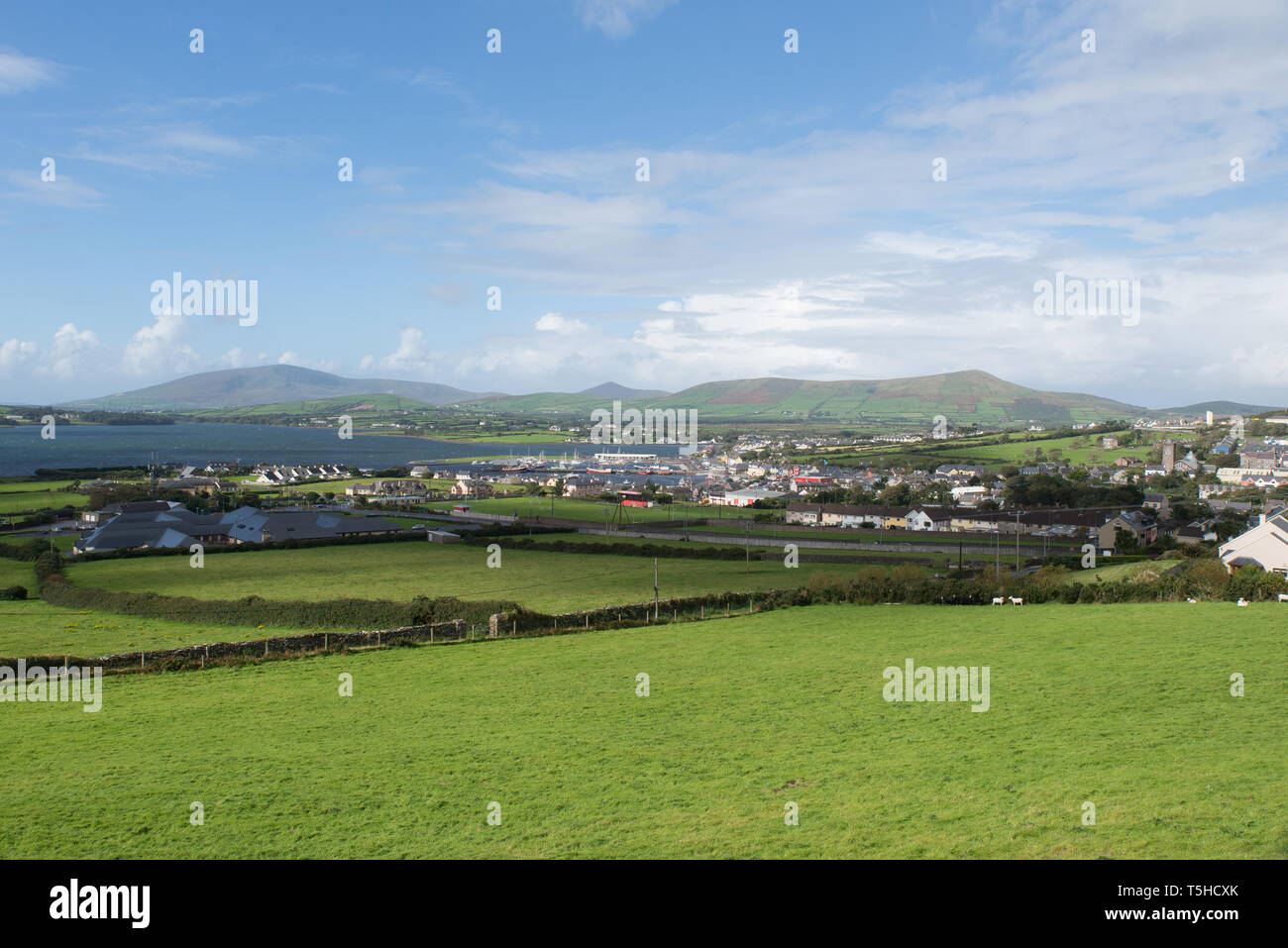 Dingle bay and the village of Dingle (a fishing harbour with 2,000 ...