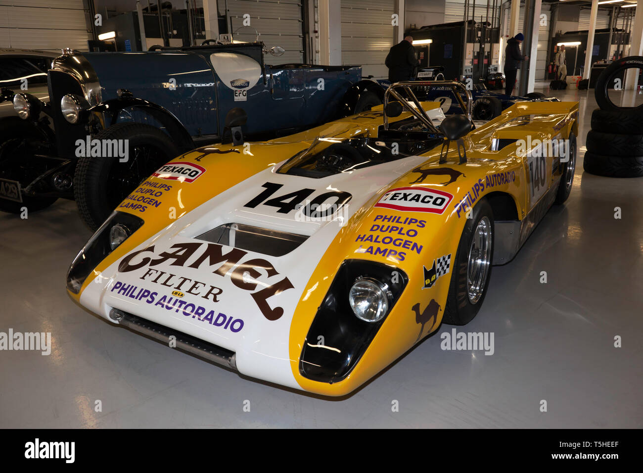 Three-quarter front view of a Yellow and White, 1971, Lola T212, in the ...