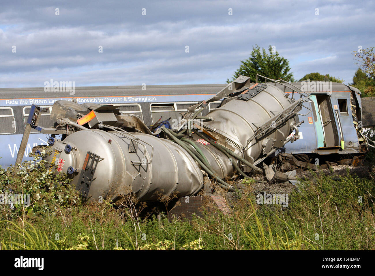 Wreckage of the train and waste disposal truck after they collided at a ...