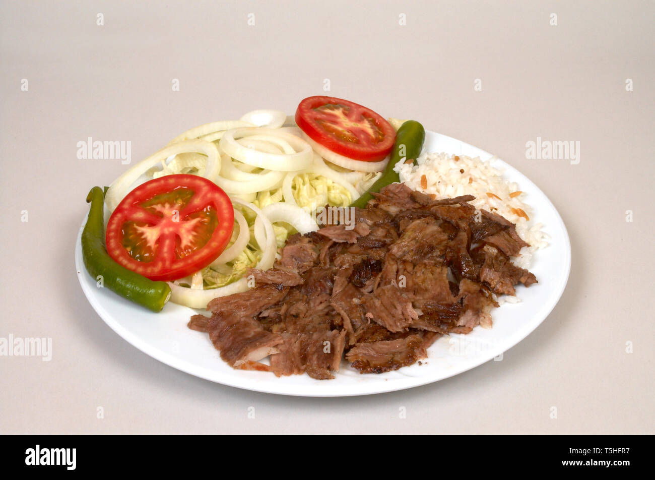 Doner kebap with rice and salads Stock Photo - Alamy