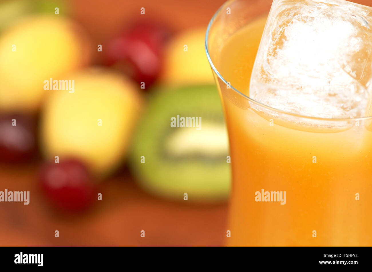 fruits juice with ice Stock Photo - Alamy