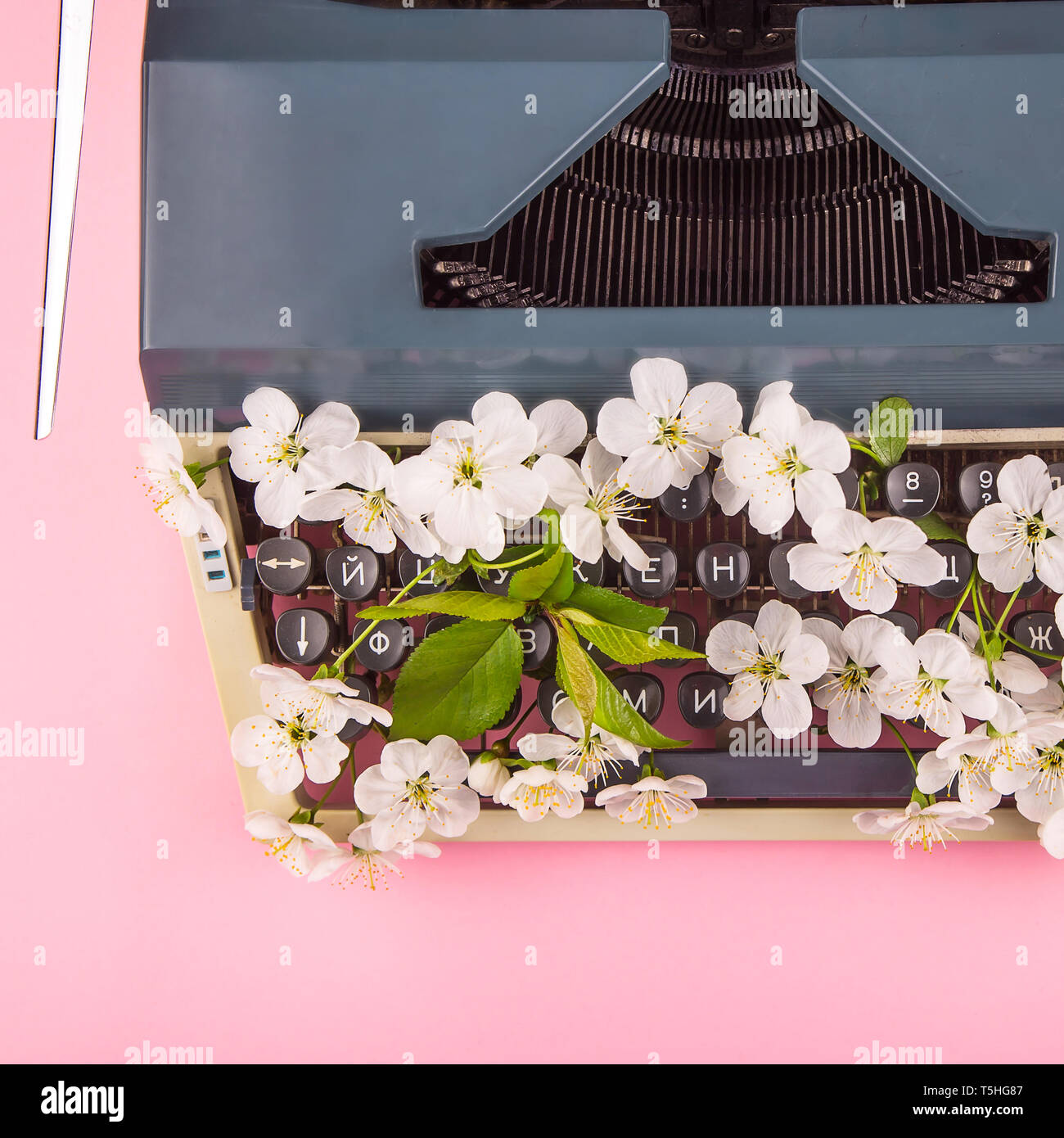 Typewriter with white flowers from the keys - spring writing creativity ...