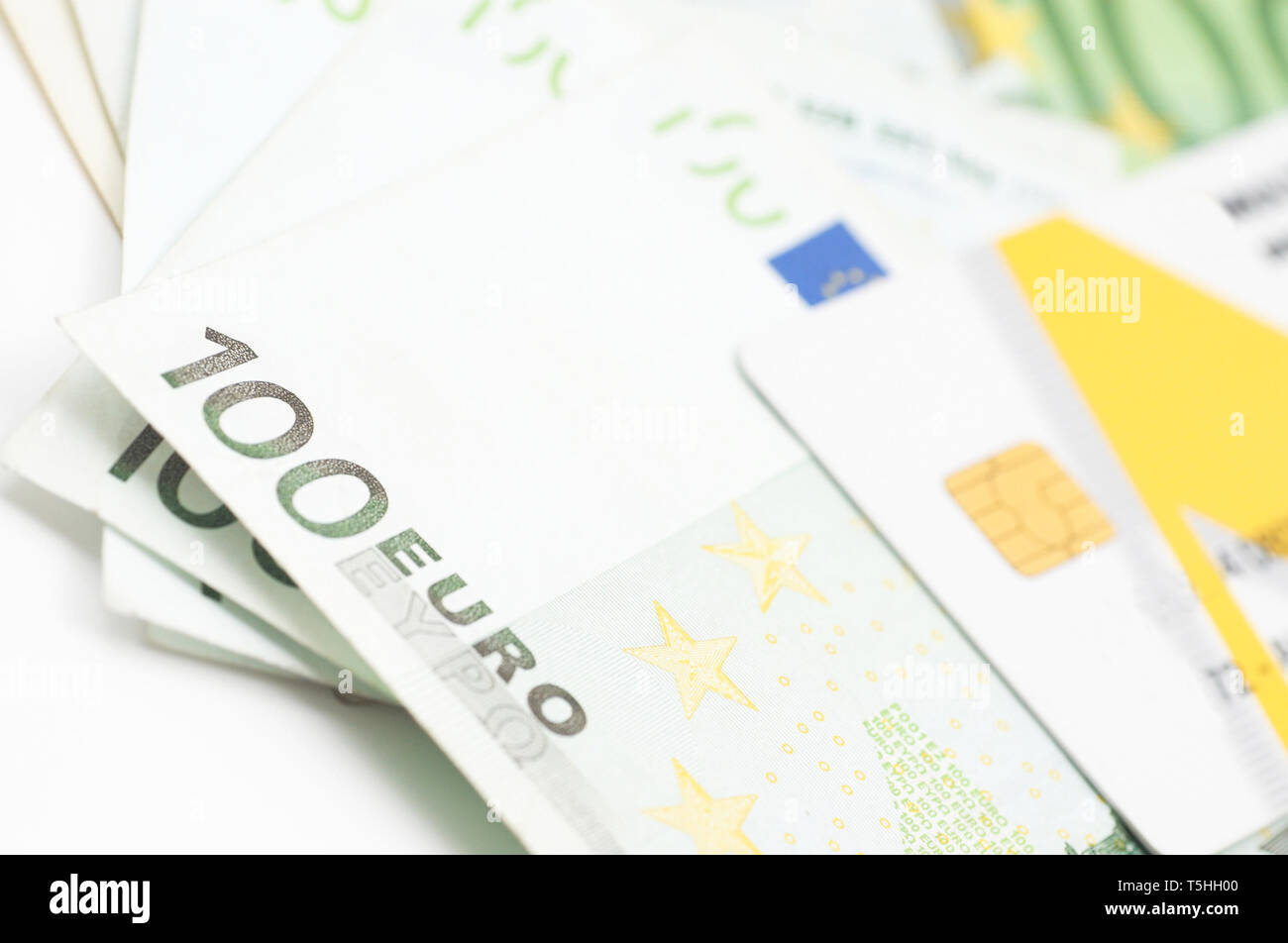 euro and credit card close up on white Stock Photo - Alamy