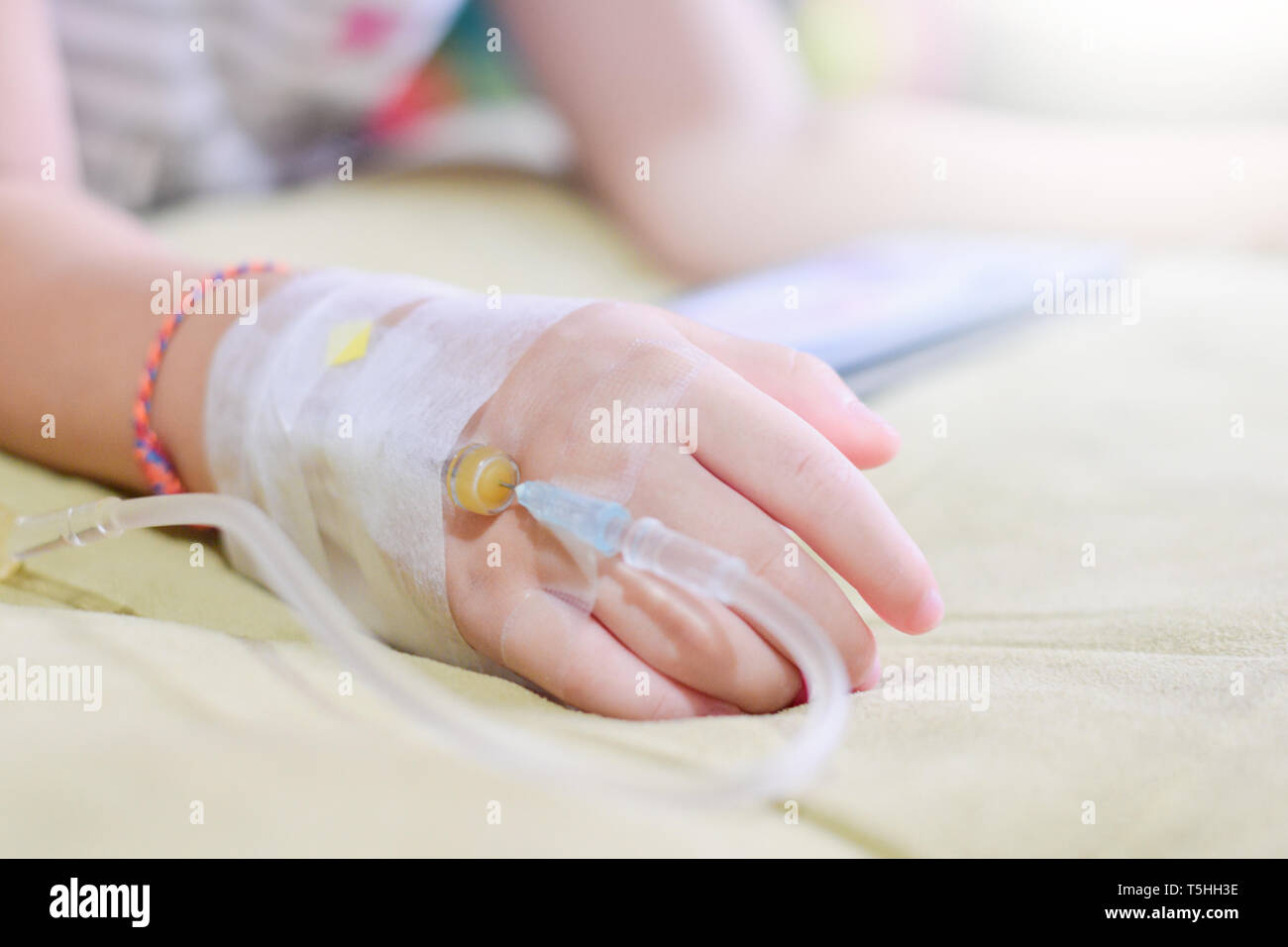 Iv fluid child hand hi-res stock photography and images - Alamy