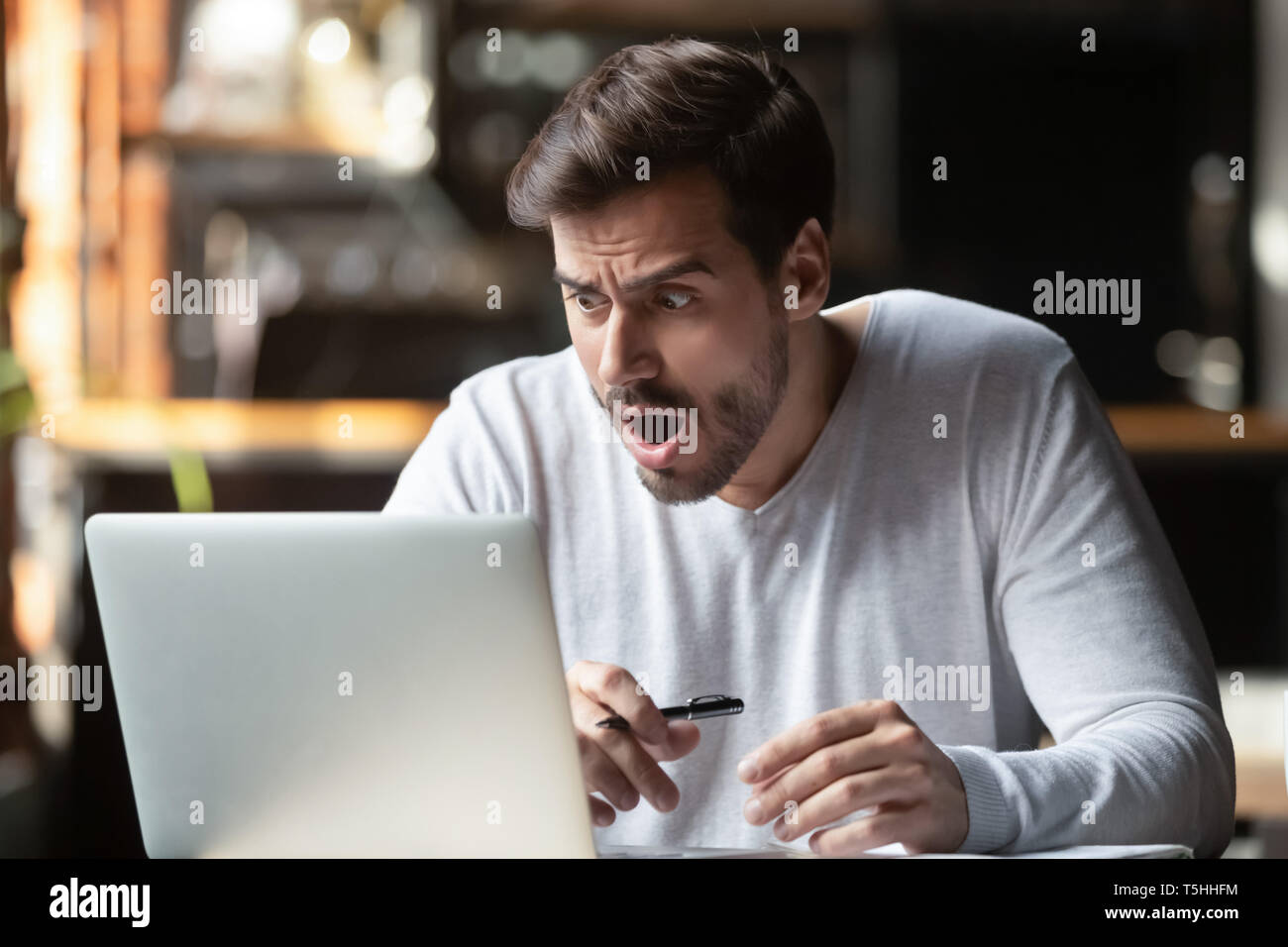 Man Looking Shocked Computer Stock Photos & Man Looking Shocked ...