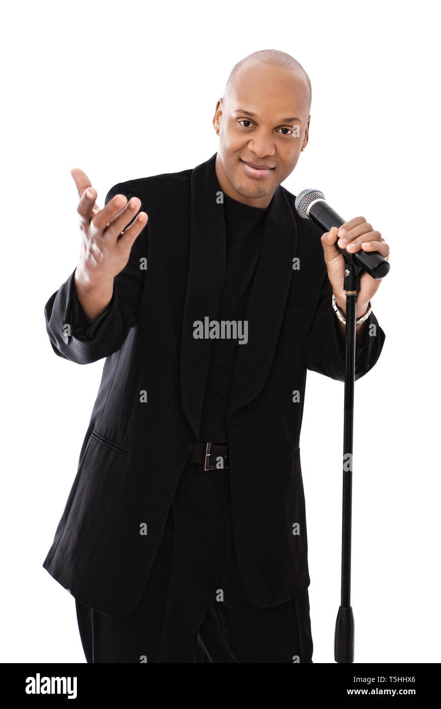 handsome african american singer with microphone on white Stock Photo ...
