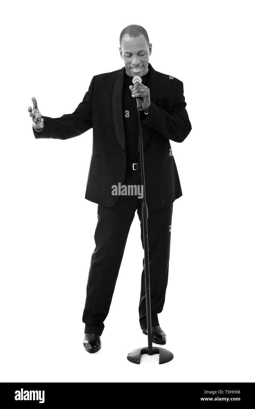 handsome african american singer at performance on white, black and ...